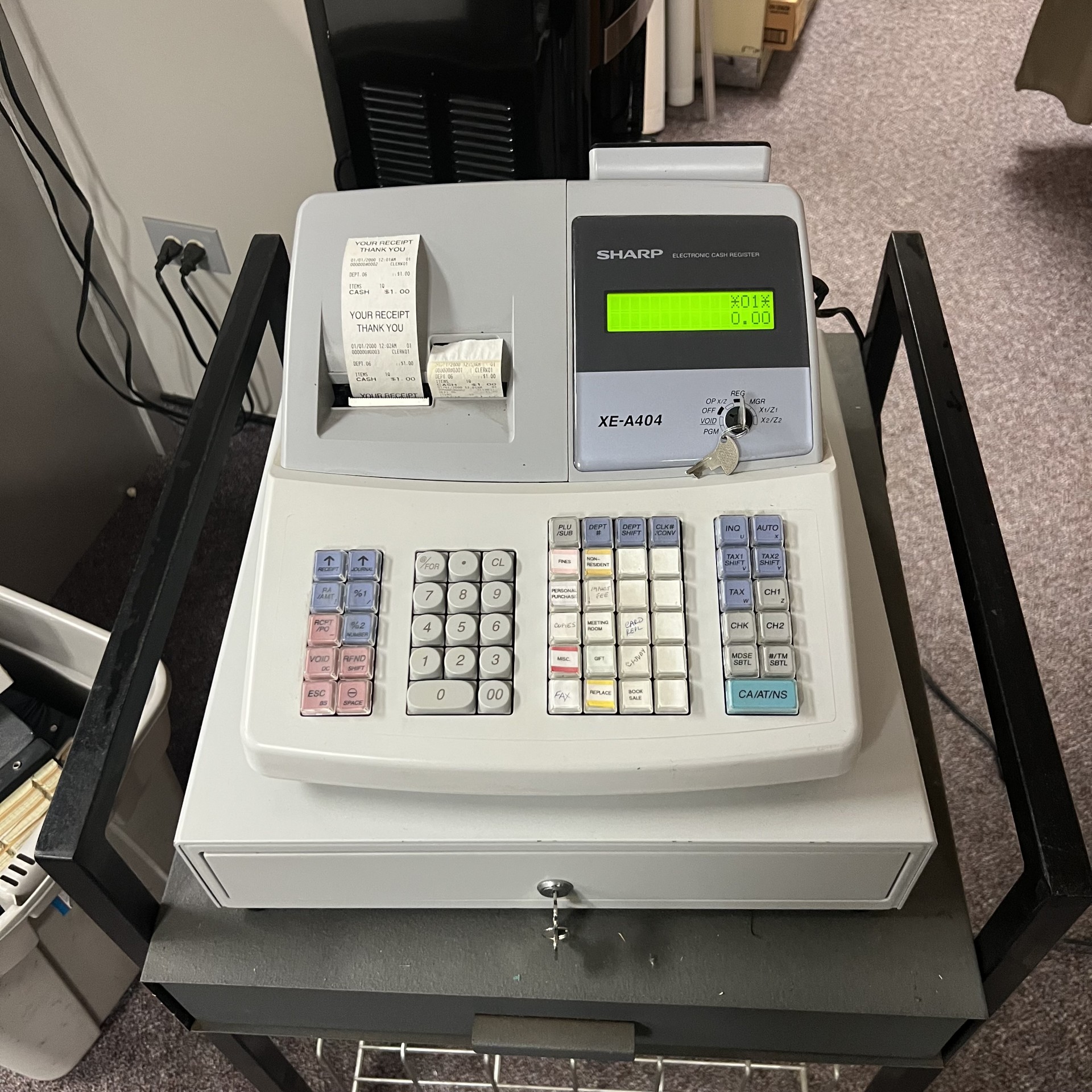 sharp xe-a404 cash register | Reaching Across Illinois Library System